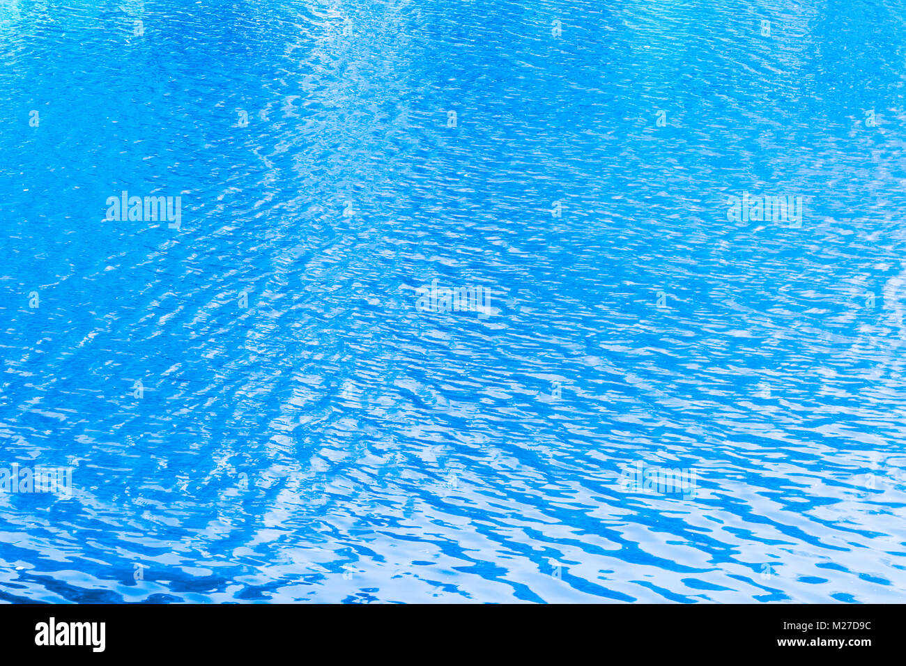 blue ripples on the surface of water in lake Stock Photo - Alamy