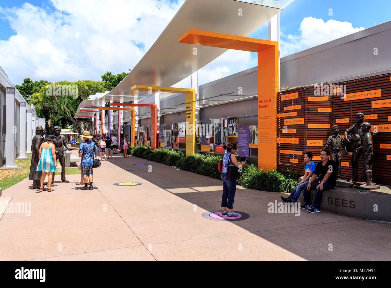People visiting the Bee Gees Celebration Memorial in their home town of ...