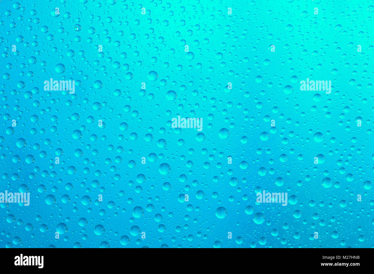 Blue water drop background Stock Photo - Alamy