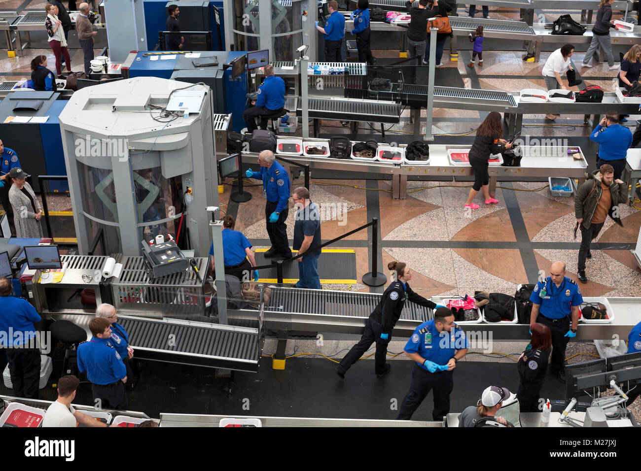 TSA agents at the Denver International Airport in the United States ...