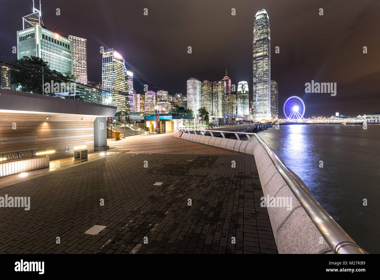 Waterront promenade along the Victoria harbour in Hong Kong island ...