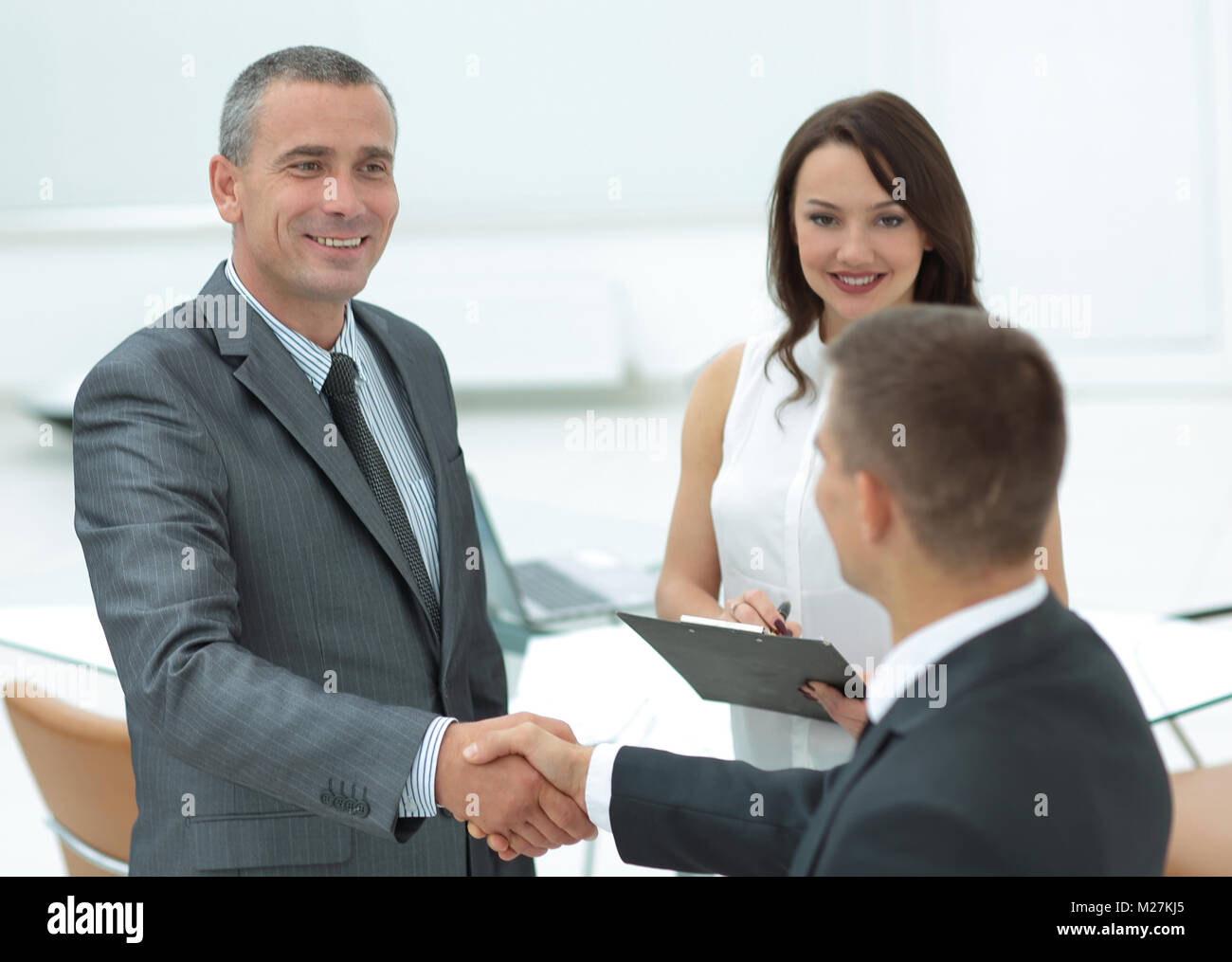 closeup.handshake of business partners in the office Stock Photo - Alamy