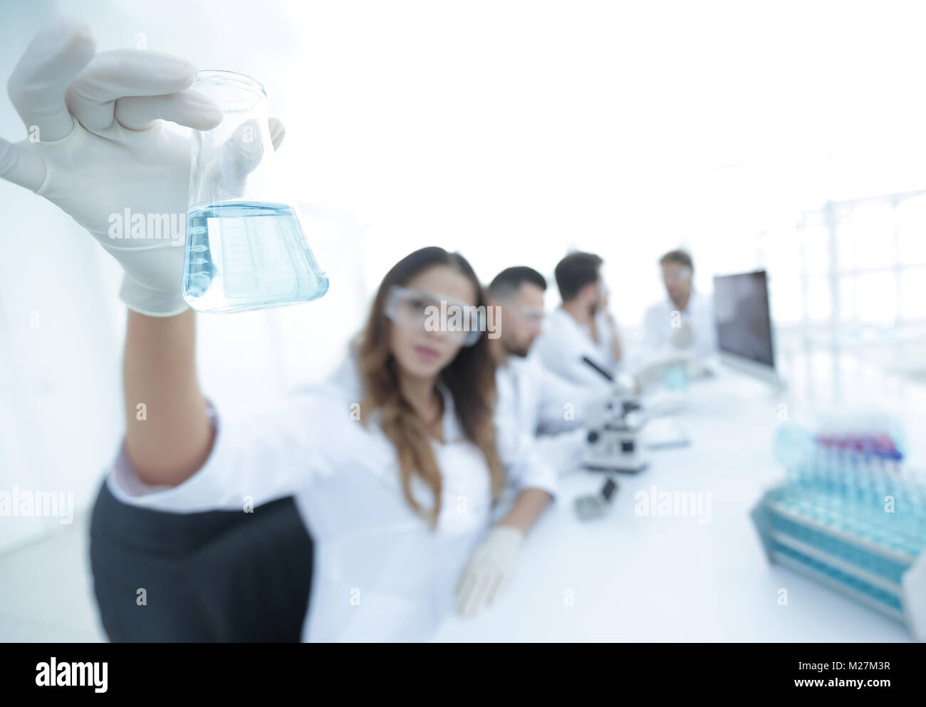 group of young scientists working in the laboratory Stock Photo - Alamy