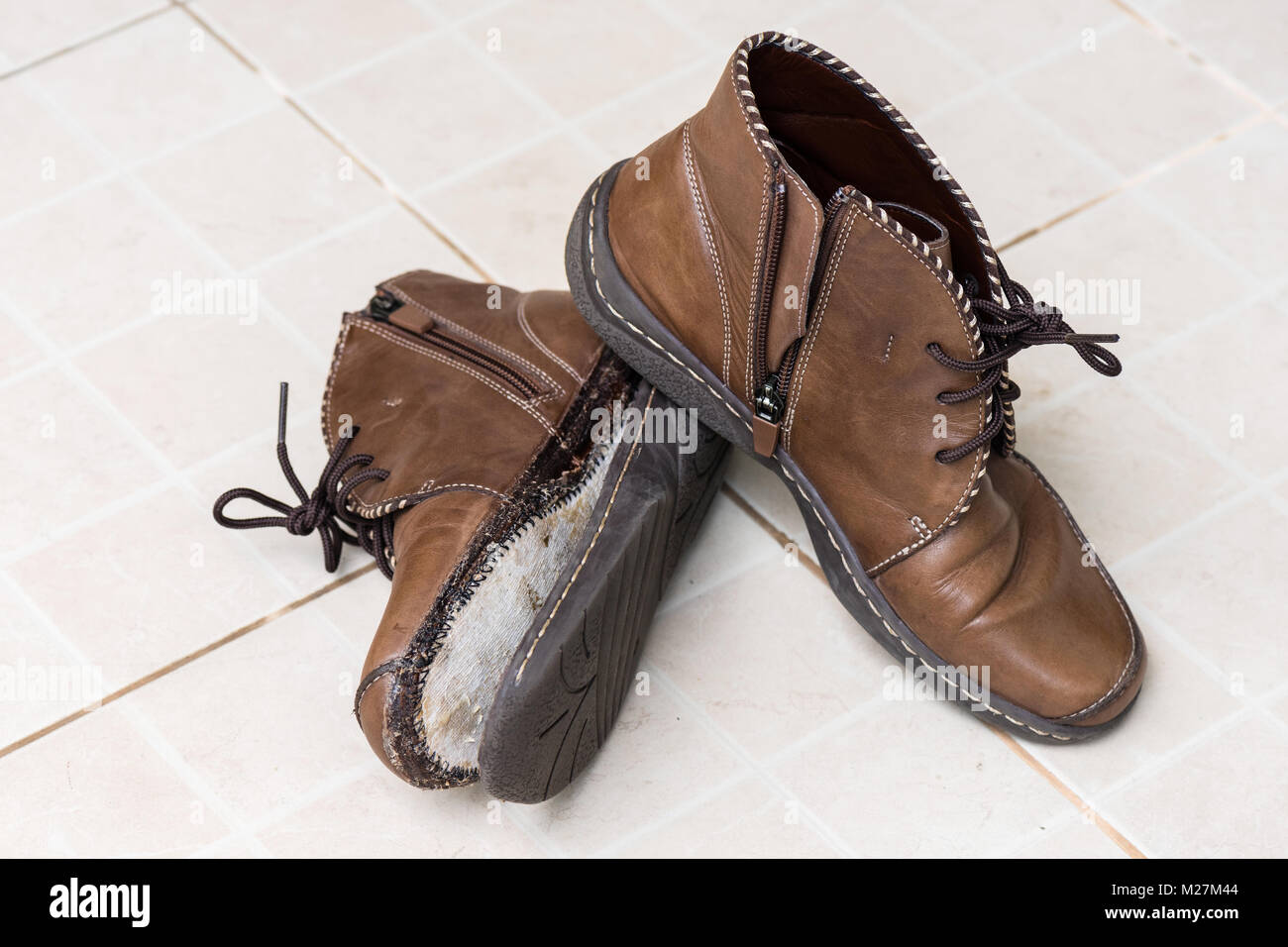 torn women shoe, closeup broken women leather shoe need to repair Stock ...