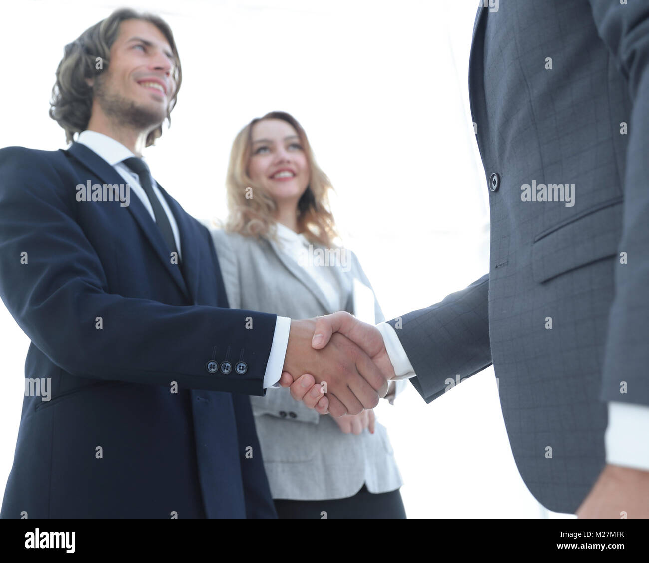 Photo of handshake of two happy businessmen Stock Photo - Alamy