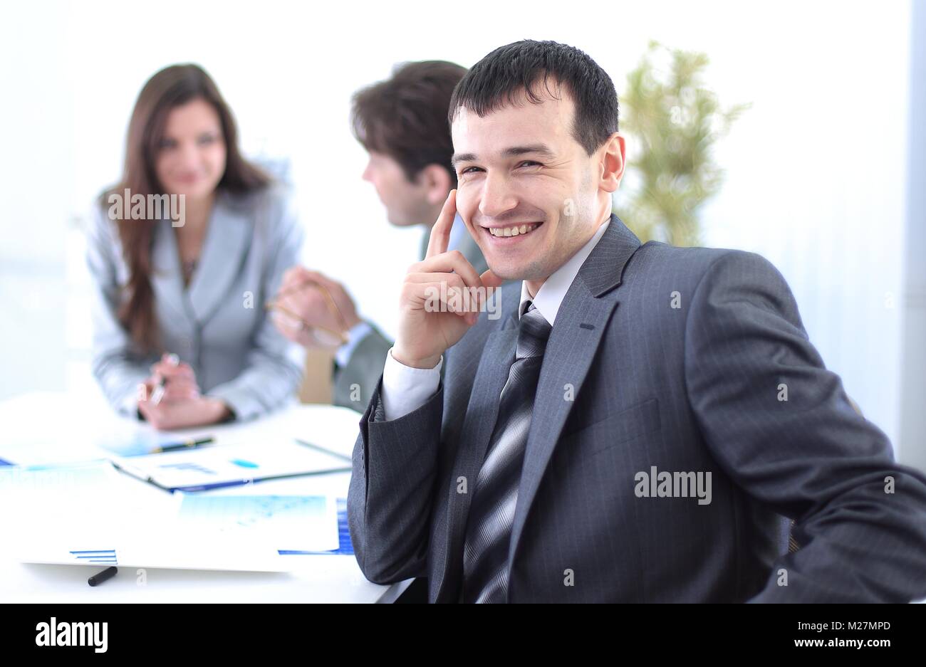 successful businessman in the workplace Stock Photo - Alamy