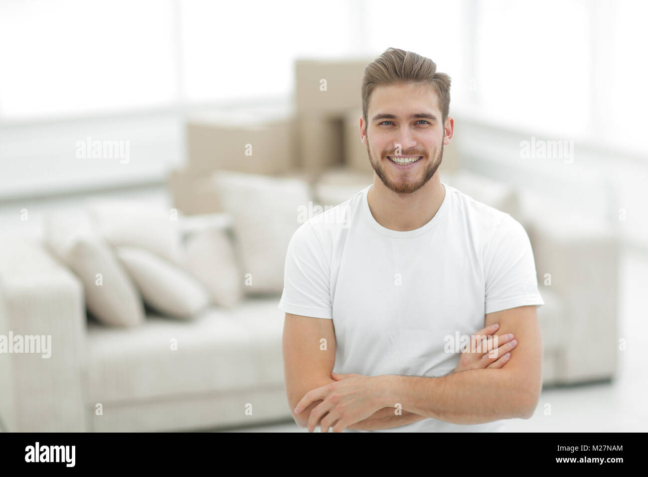 man on the background of the new apartments Stock Photo - Alamy