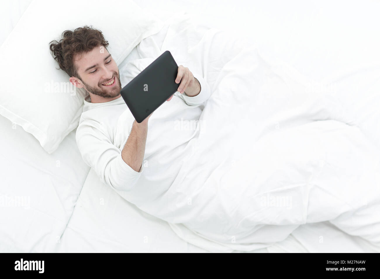 background image . man reading on digital tablet Stock Photo - Alamy