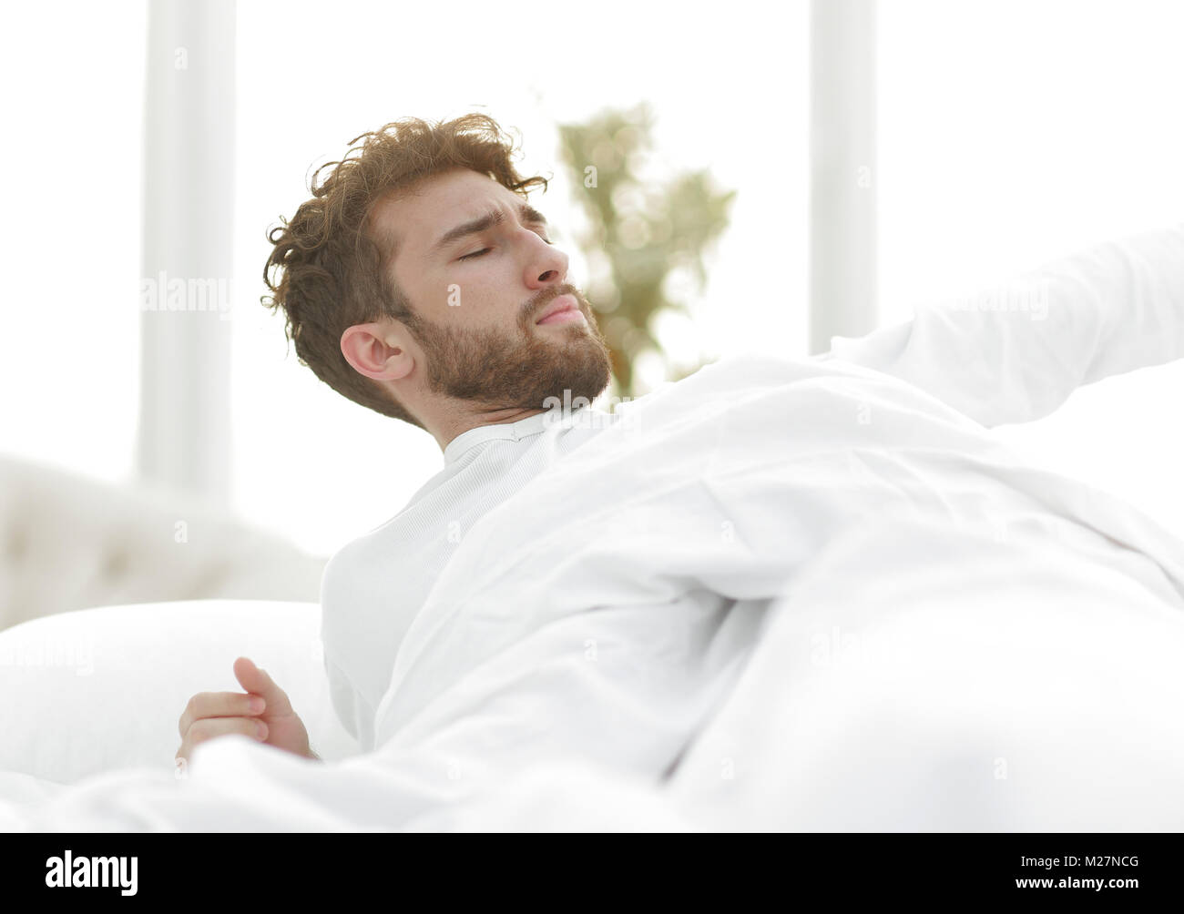 Sofa bed sleeping man hi-res stock photography and images - Alamy