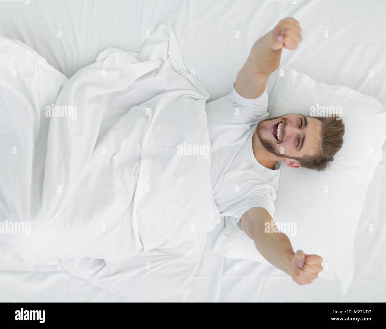 closeup.happy man lying on the sofa Stock Photo - Alamy