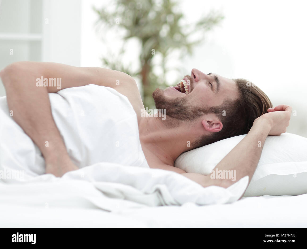 business man falling asleep in the comfortable hotel room Stock Photo ...