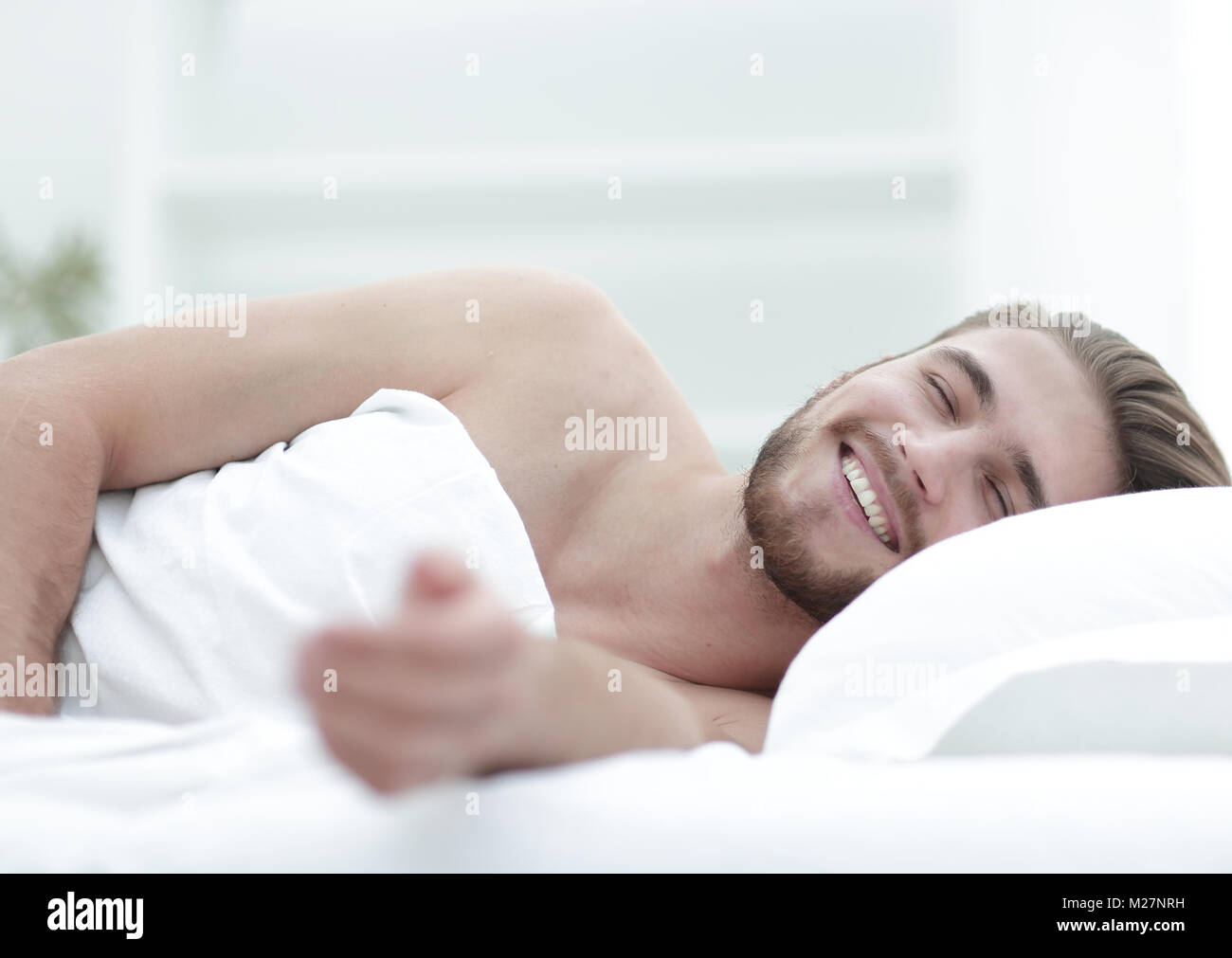 happy man relaxing in a cozy room Stock Photo - Alamy