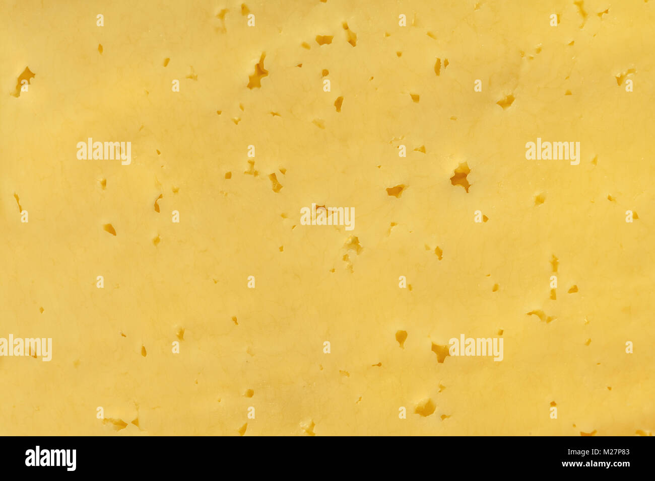 Yellow cheese holes texture hi-res stock photography and images - Alamy