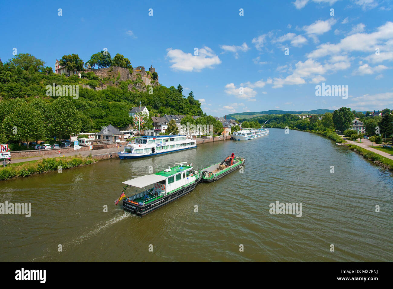 Barge and excursion ship on Saar river, above the Saarburg castle, Saarburg at Saar river ...