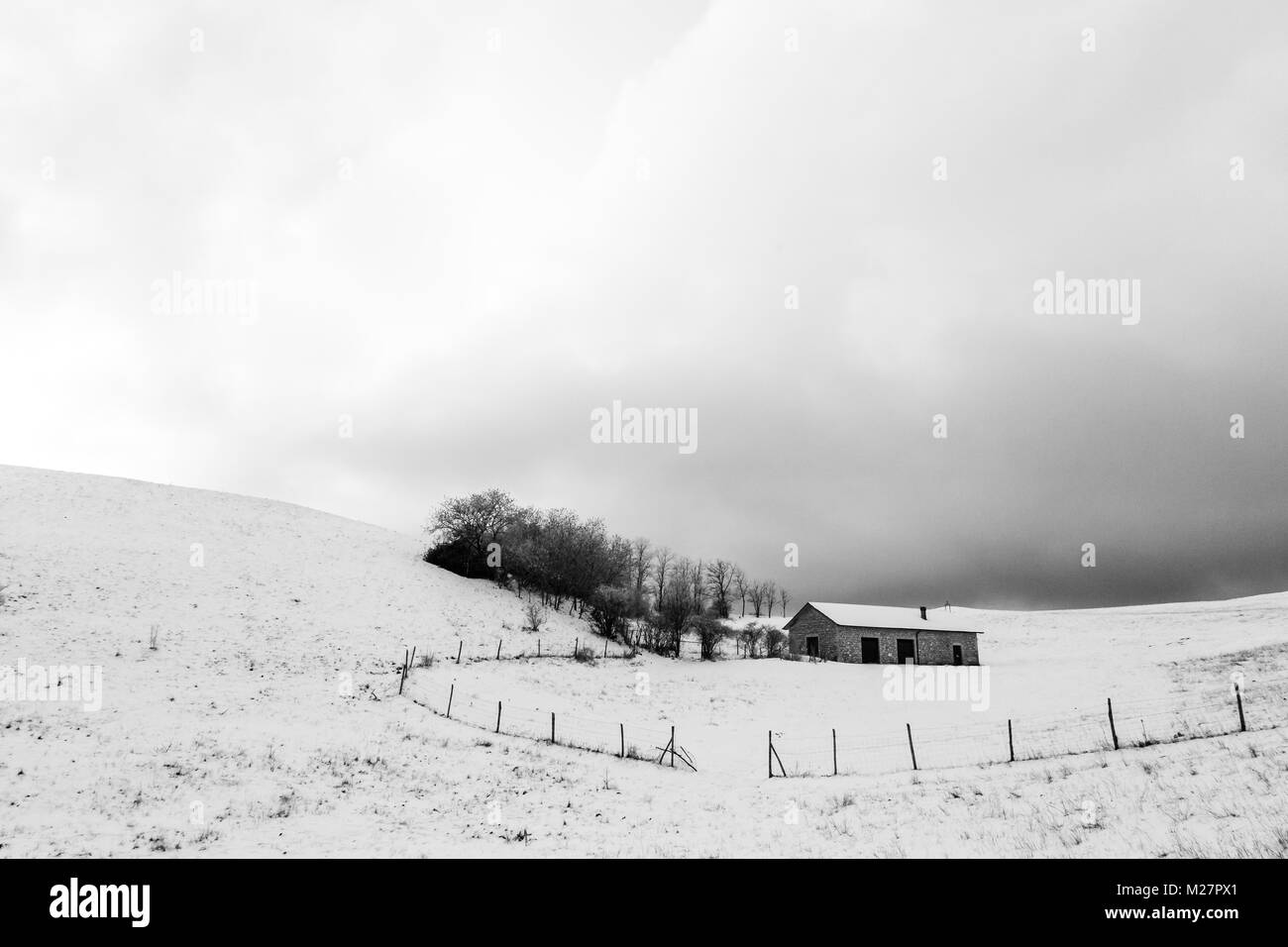 A small mountain retreat covered by snow on Mt. Subasio (Umbria, Italy ...