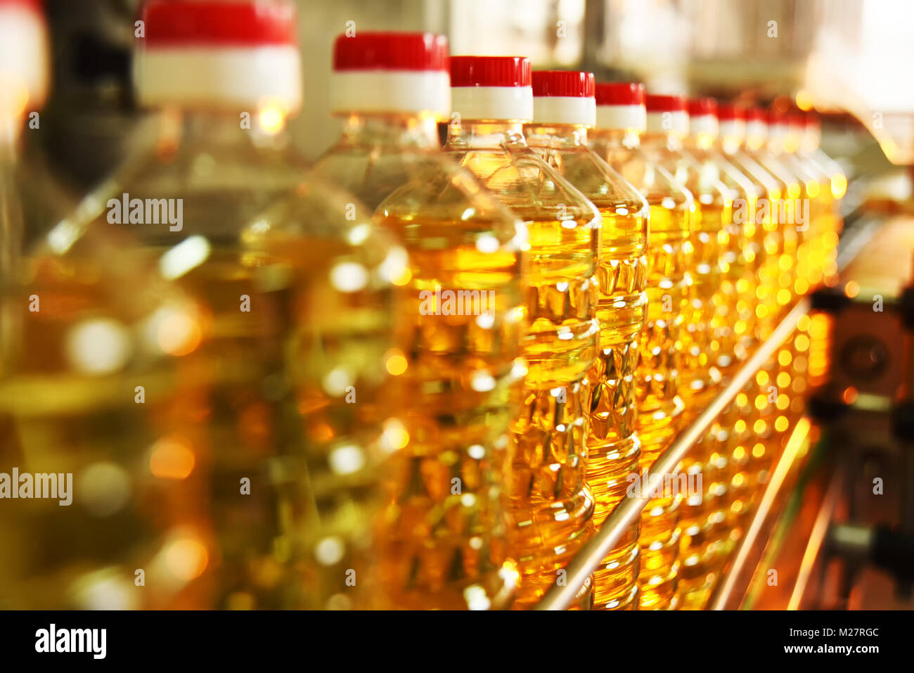 line or conveyor for food production of sunflower oil Stock Photo - Alamy