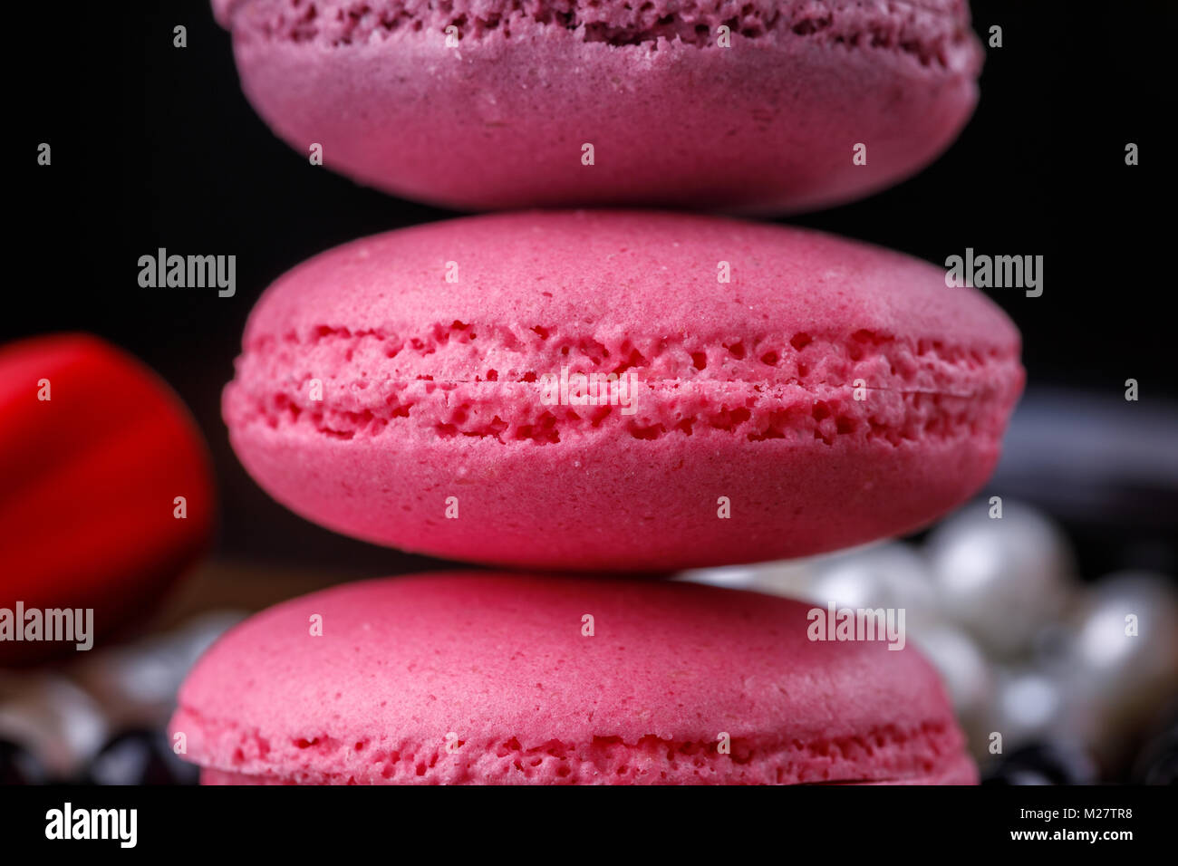 Pyramid of macaroons of pink shades. Close-up Stock Photo - Alamy