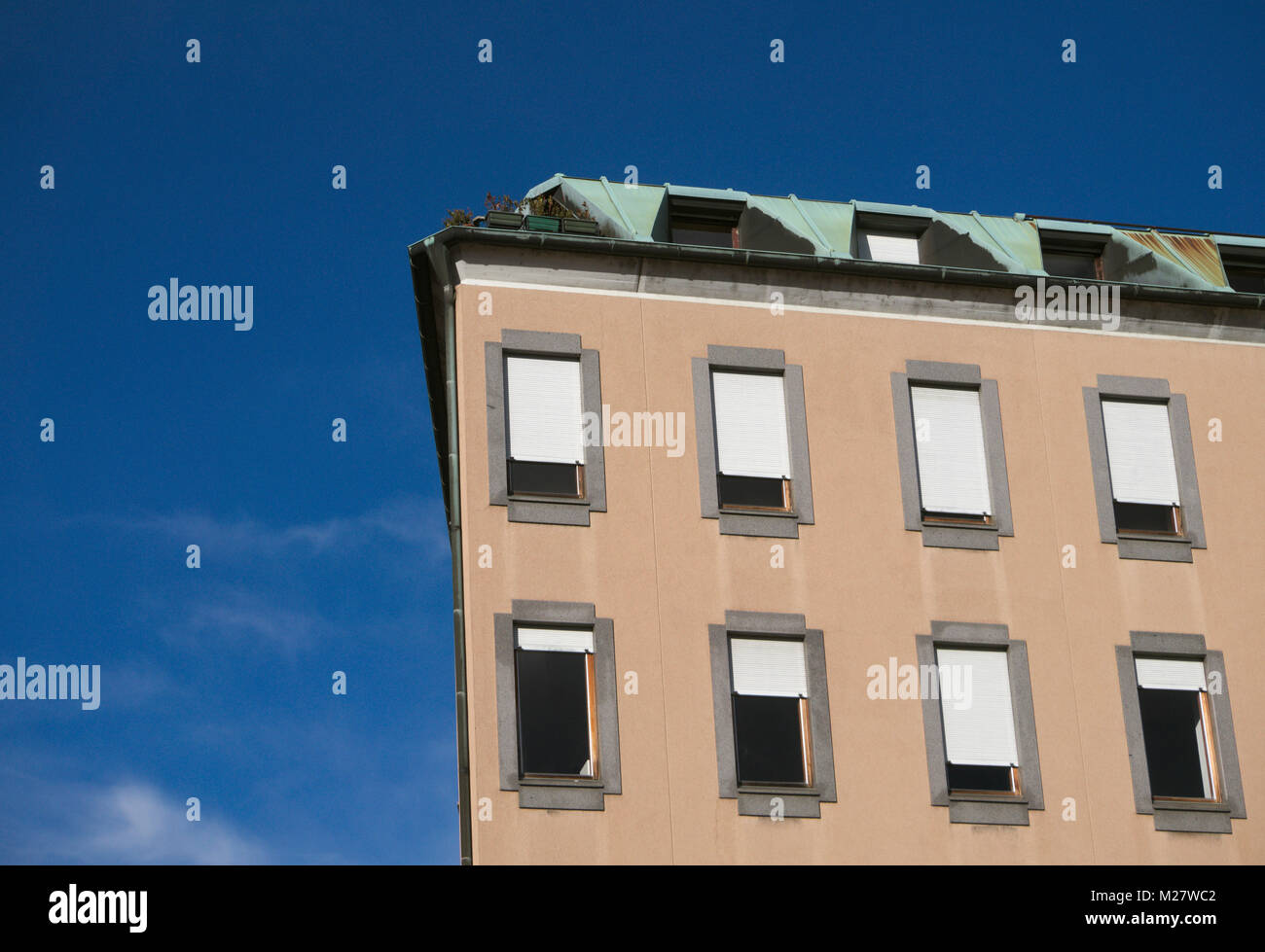 residential building corner with mansard roof, Italy Stock Photo - Alamy