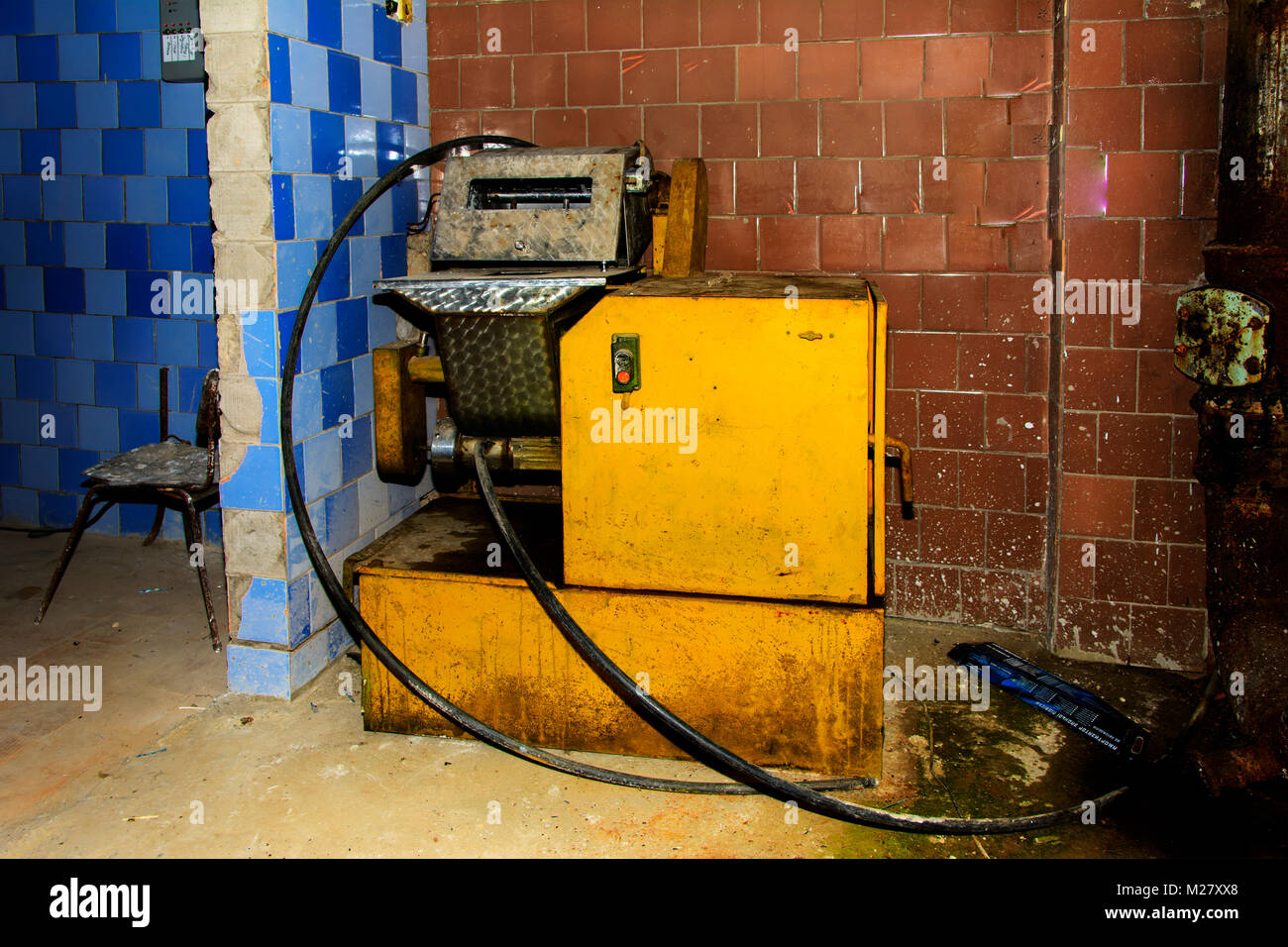 Old abandoned bakery equipment in the building of the destroyed ...