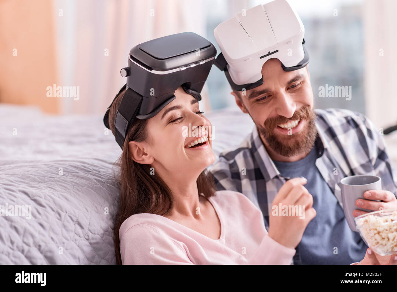 Happy young couple having break Stock Photo - Alamy
