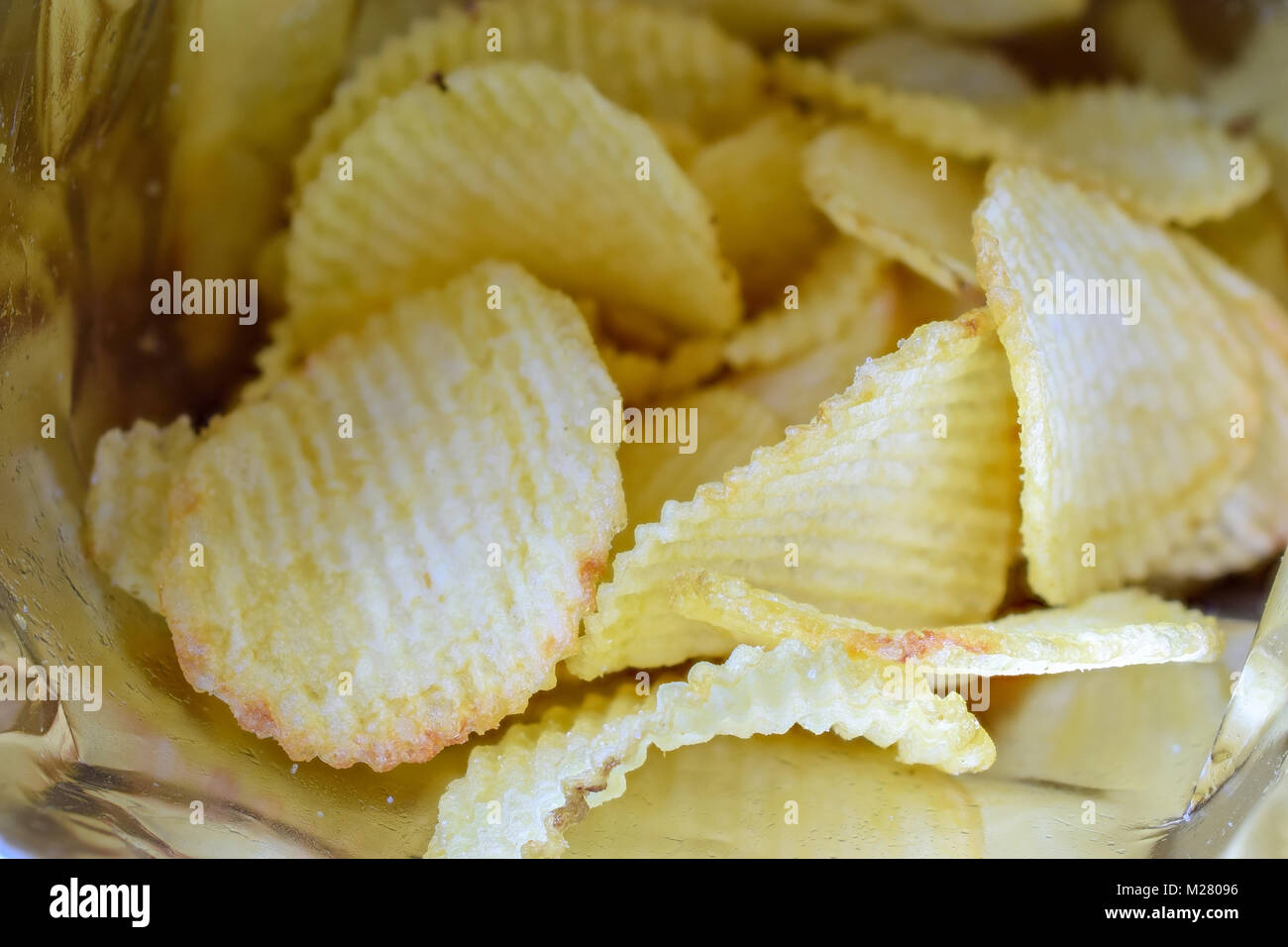 Potato chips is snack in bag ready to eat and fat food or junk food ...