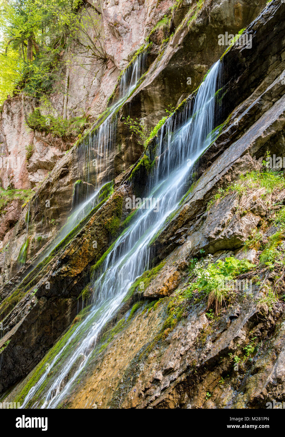 Waterfall on mossy slope, Wimbachklamm, Wimbachtal, Ramsau near ...
