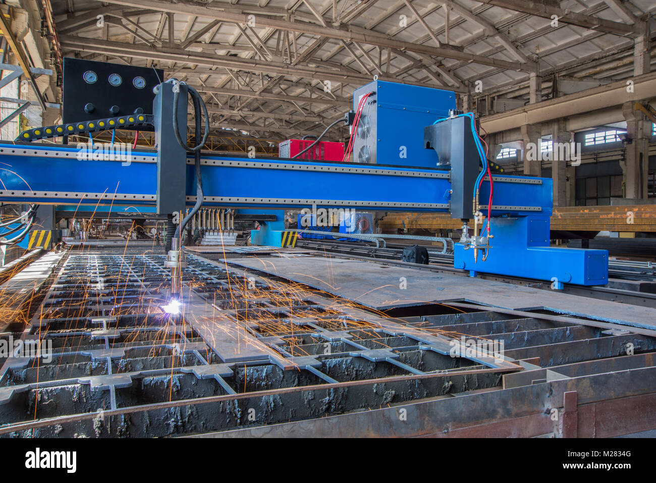 automatic laser machine cuts the metal sheets. equipment gas welding ...