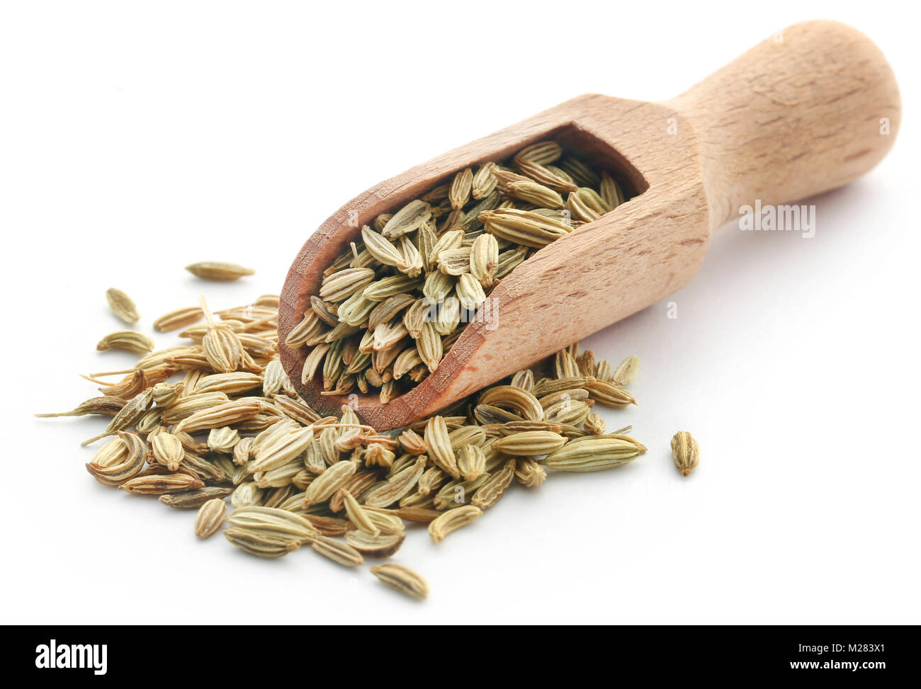 Fennel seeds over white background Stock Photo - Alamy