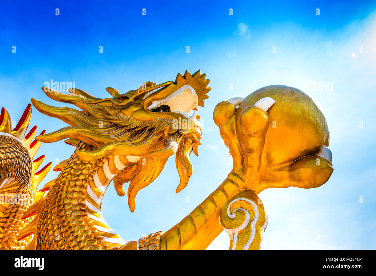 Statue of gold dragon in Asian temple, blessing and lucky on Chinese ...