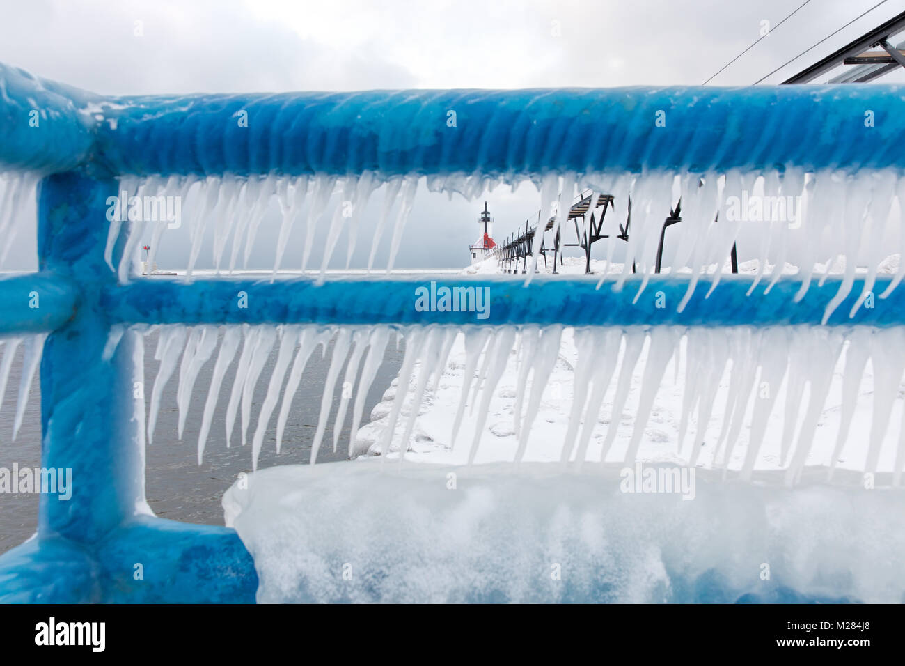 The ice covered lighthouse of St. Joseph, Michigan, on Lake Michigan in ...