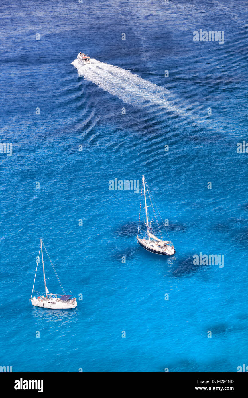 Azure bay with yachts in Greek sea Stock Photo - Alamy