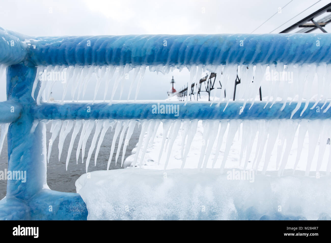 The ice covered lighthouse of St. Joseph, Michigan, on Lake Michigan in ...