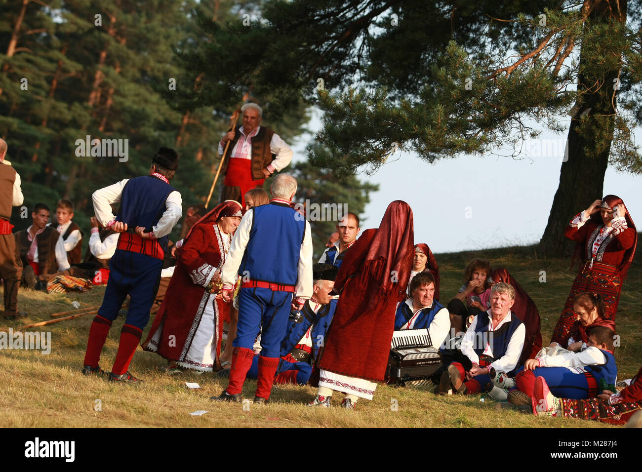 People in traditional folk costume of The National Folklore Fair in ...