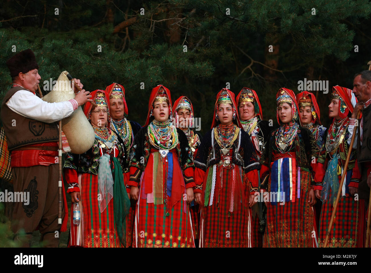 People in traditional folk costume of The National Folklore Fair in ...