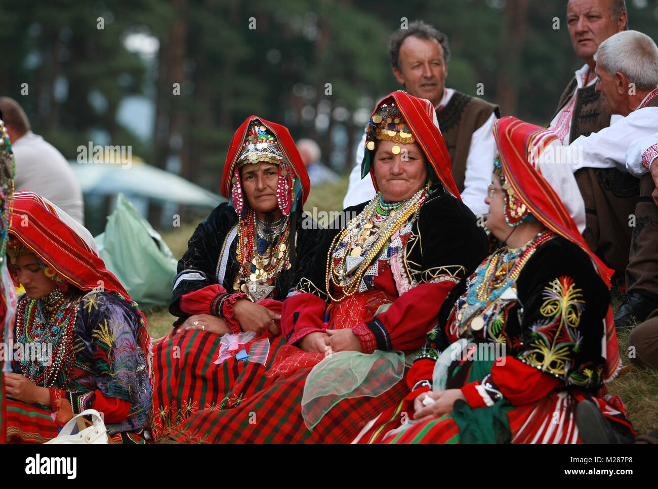 People in traditional folk costume of The National Folklore Fair in ...