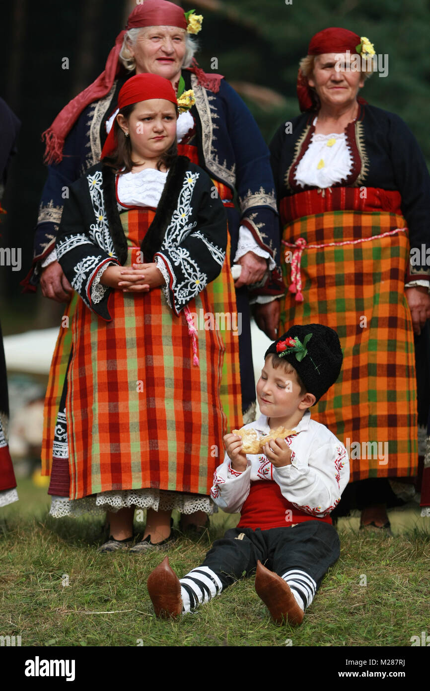 People in traditional folk costume of The National Folklore Fair in ...