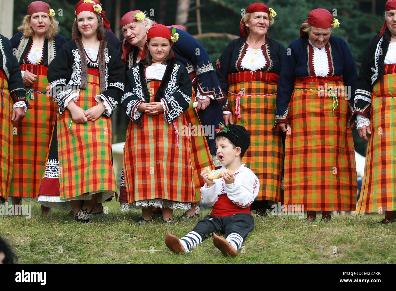 People in traditional folk costume of The National Folklore Fair in ...