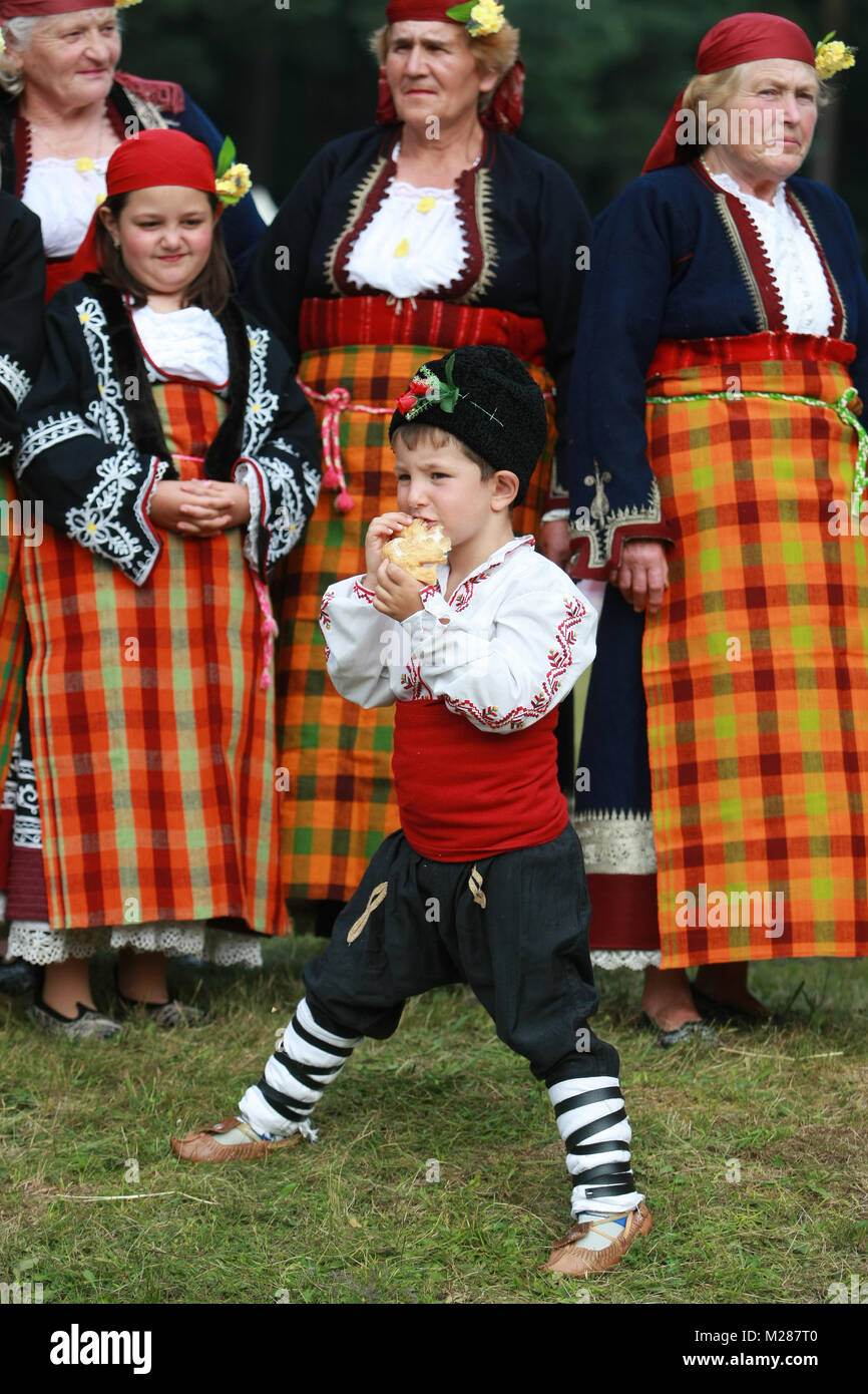 People in traditional folk costume of The National Folklore Fair in ...