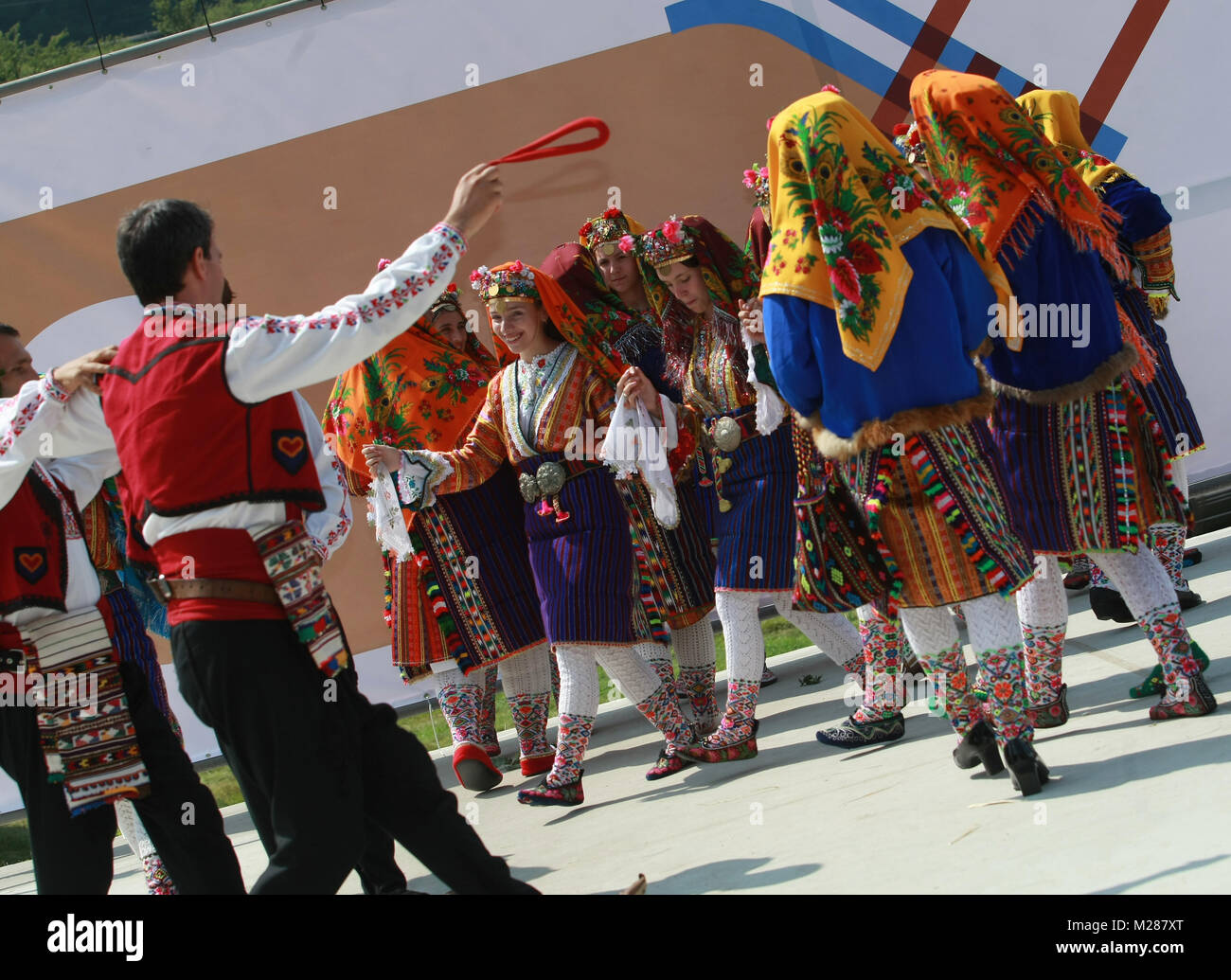 People in traditional folk costume of The National Folklore Fair in ...