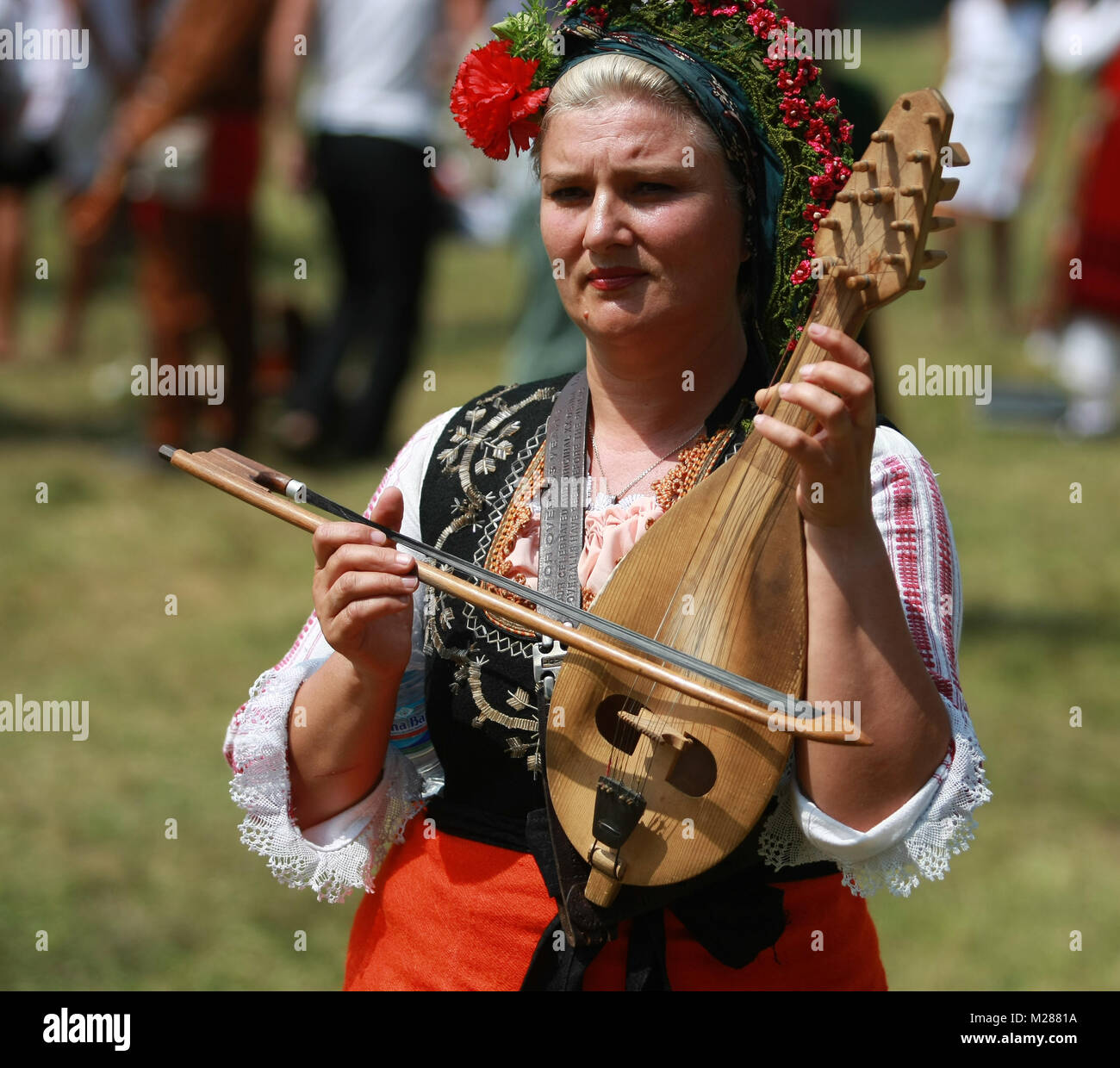 People in traditional folk costume of The National Folklore Fair in ...