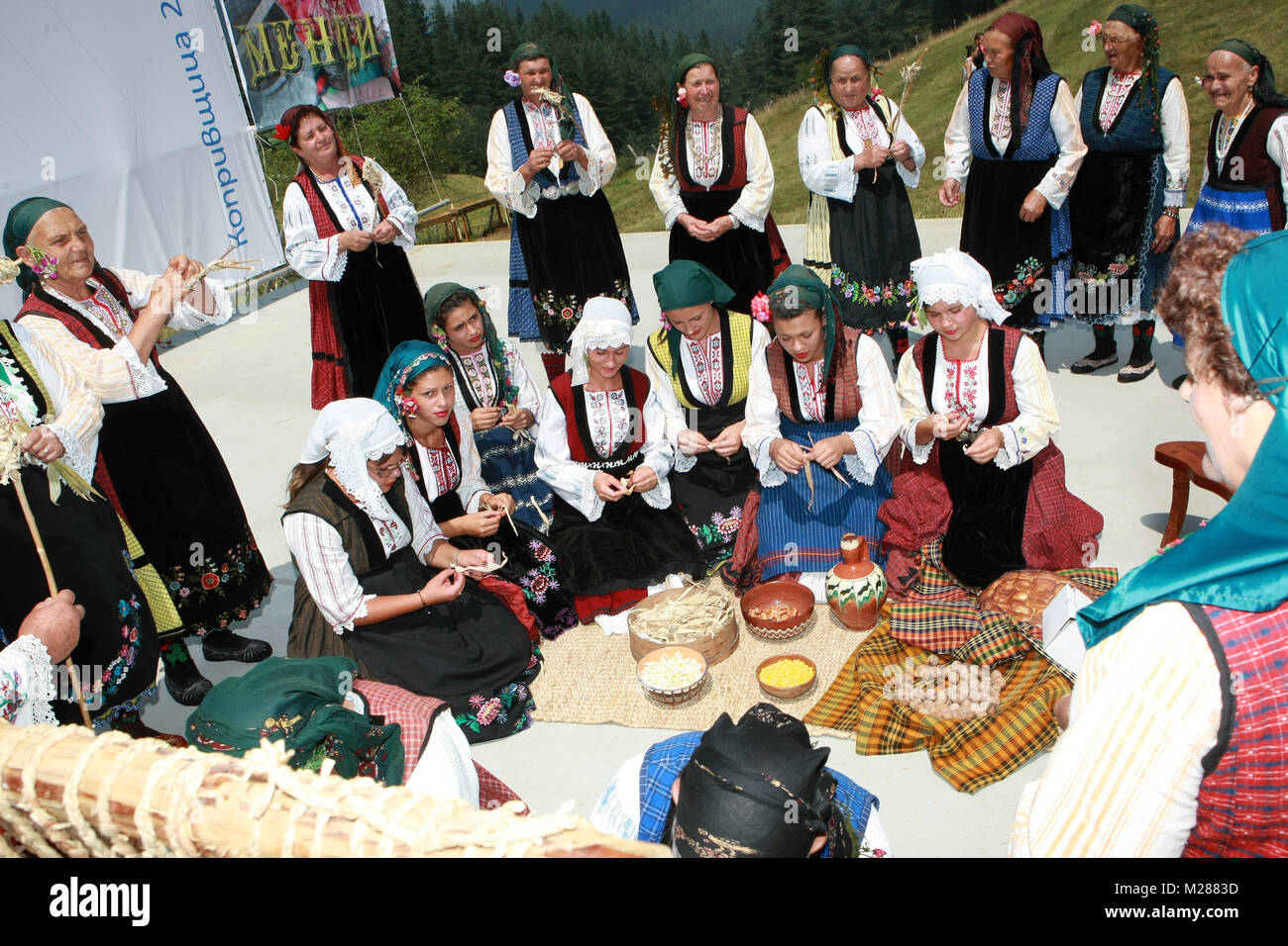 People in traditional folk costume of The National Folklore Fair in ...