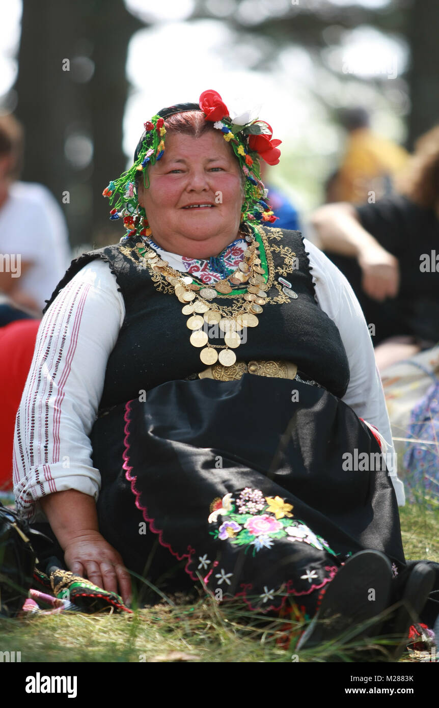 People in traditional folk costume of The National Folklore Fair in ...