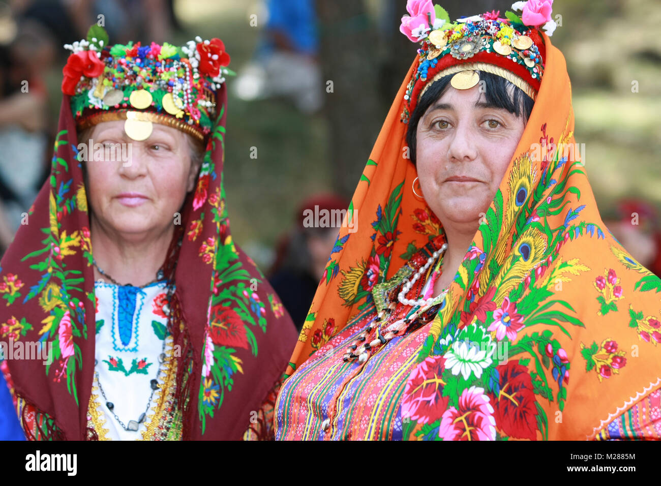 People in traditional folk costume of The National Folklore Fair in ...