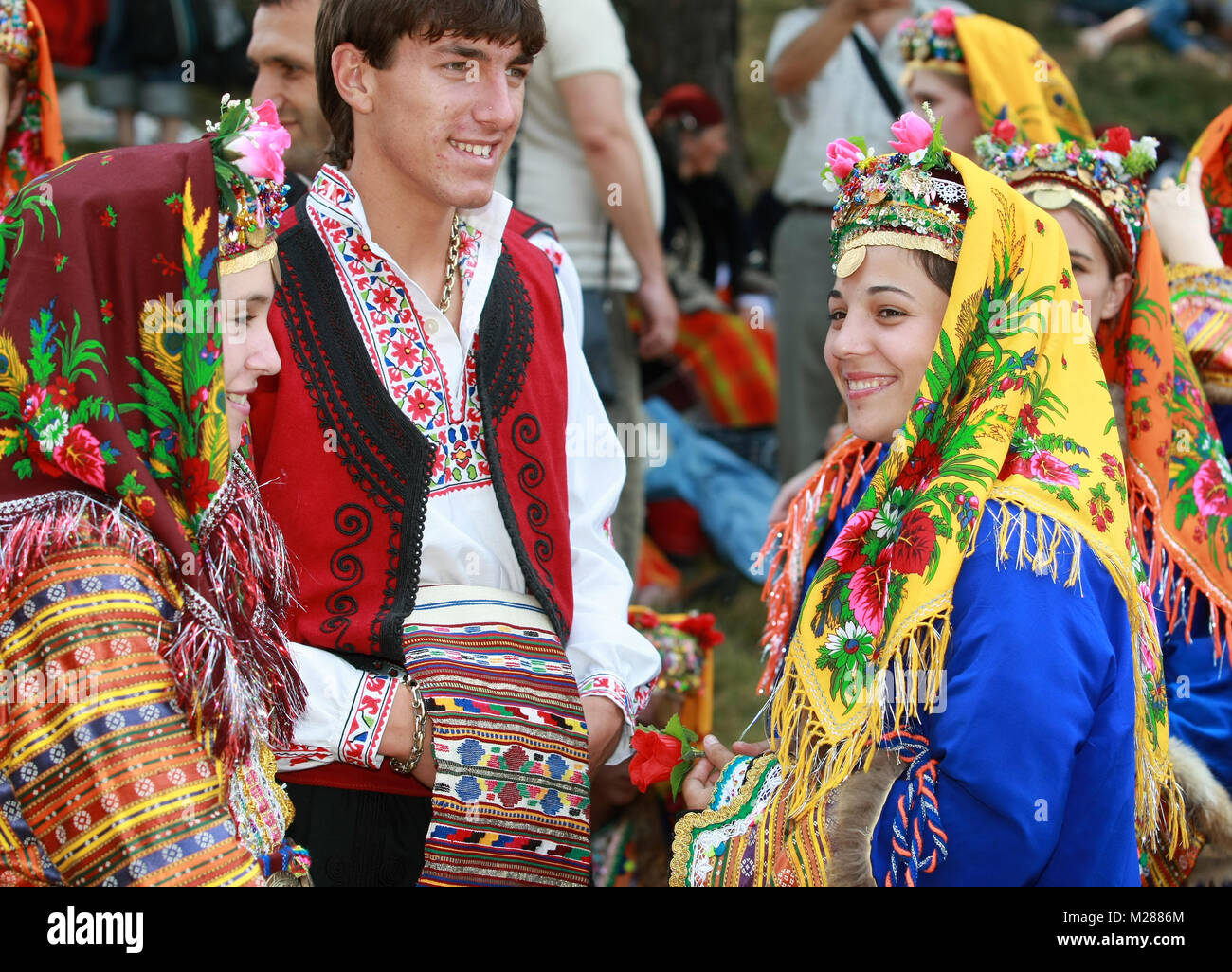 People in traditional folk costume of The National Folklore Fair in ...