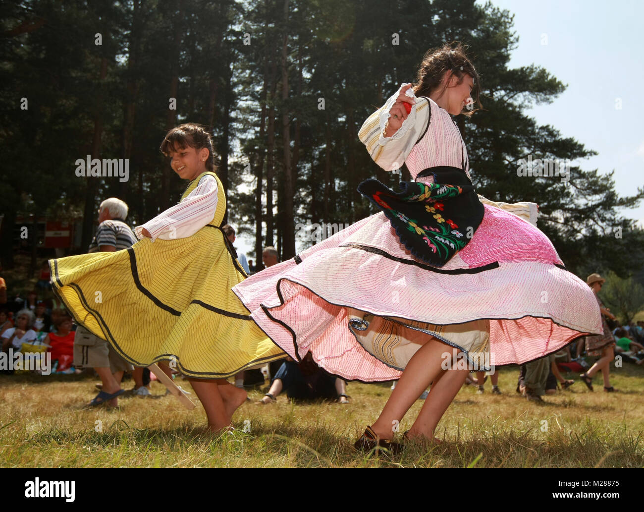 People in traditional folk costume of The National Folklore Fair in ...