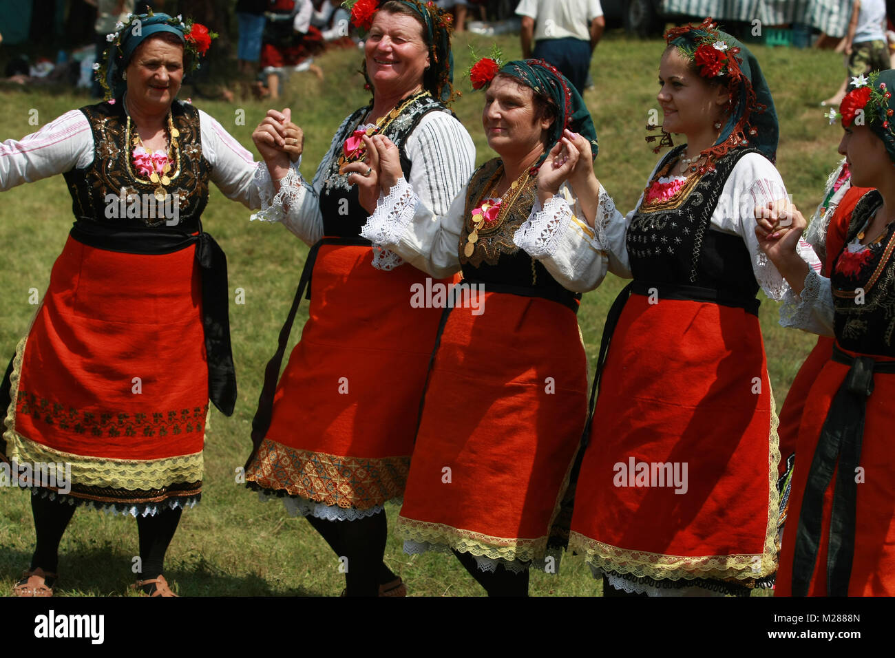 People in traditional folk costume of The National Folklore Fair in ...