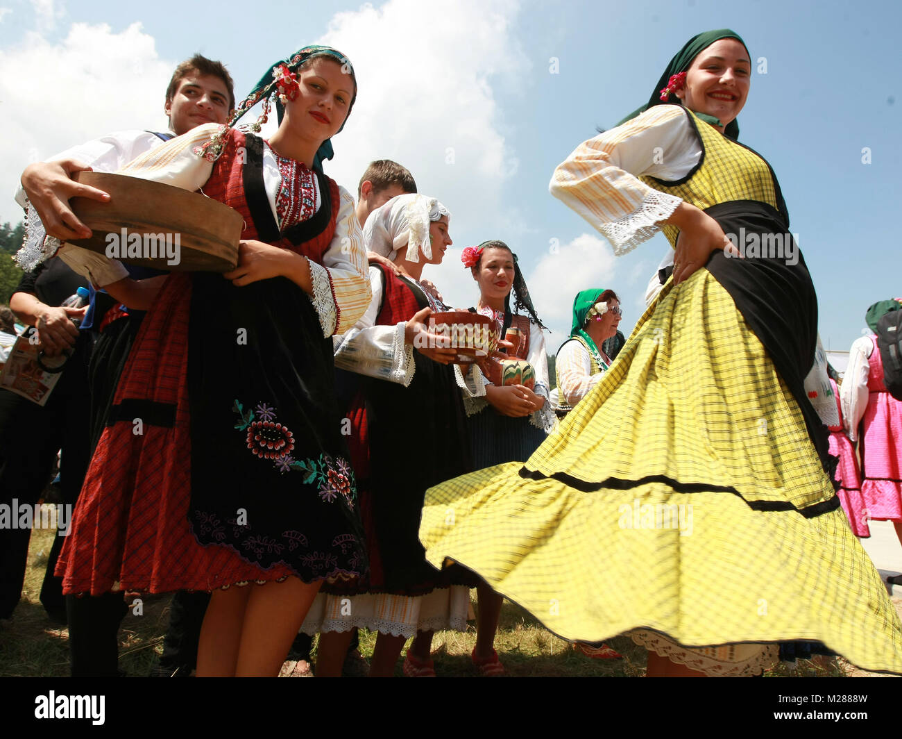 People in traditional folk costume of The National Folklore Fair in ...