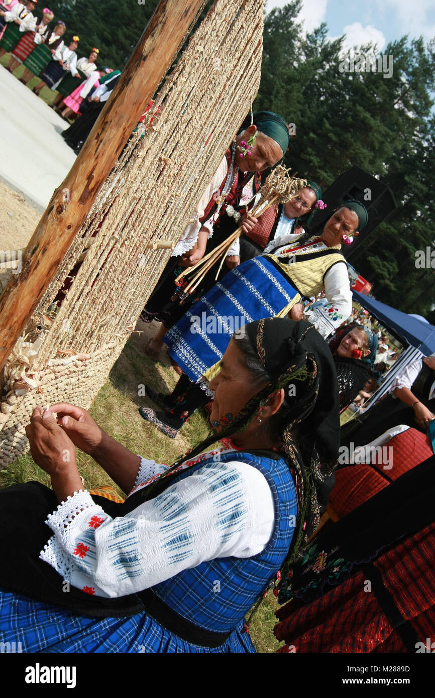 People in traditional folk costume of The National Folklore Fair in ...