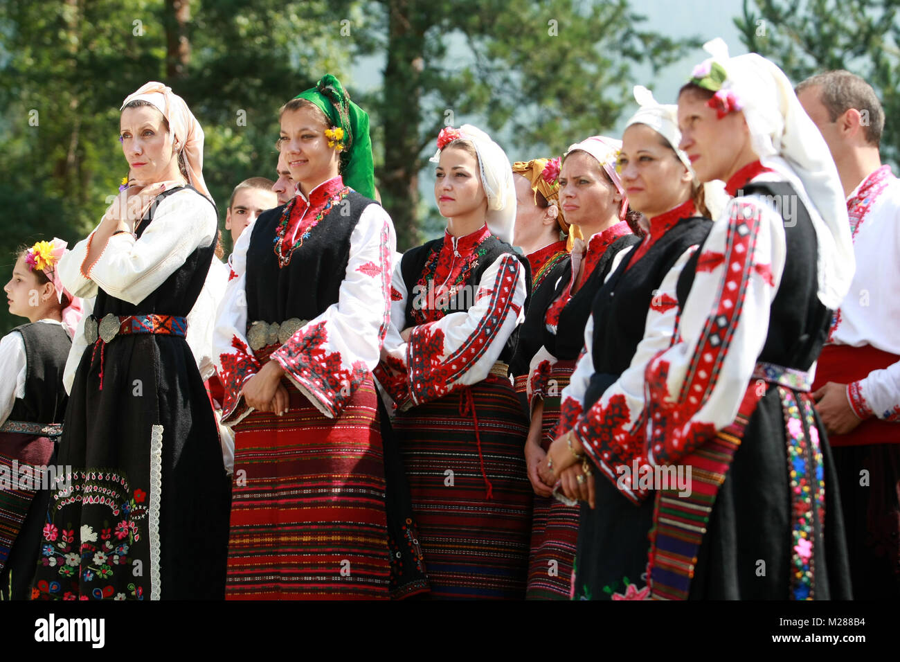 People in traditional folk costume of The National Folklore Fair in ...