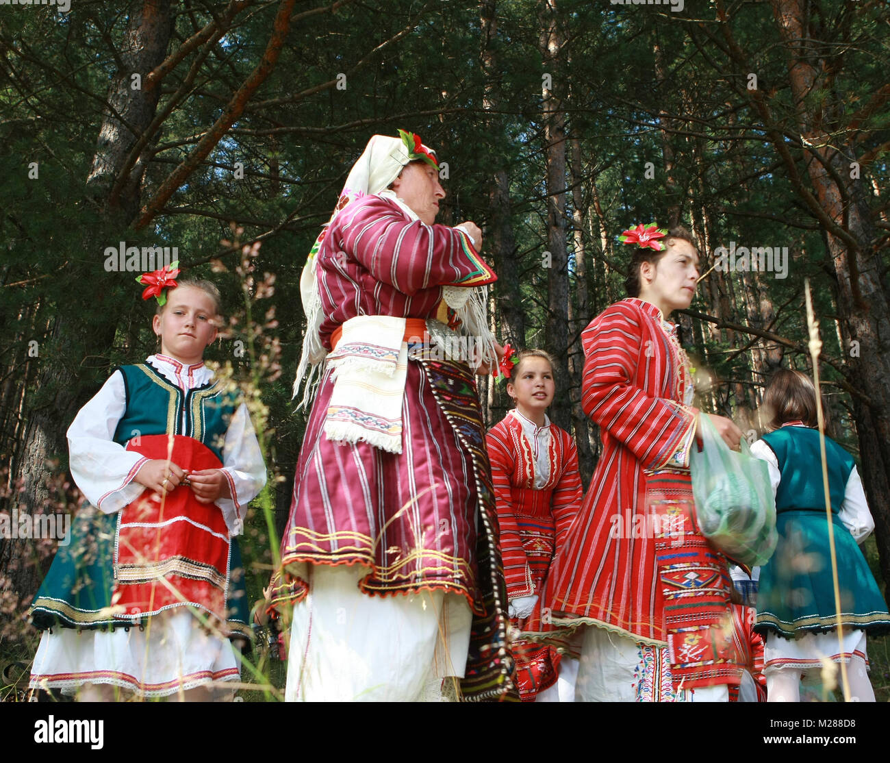 People in traditional folk costume of The National Folklore Fair in ...
